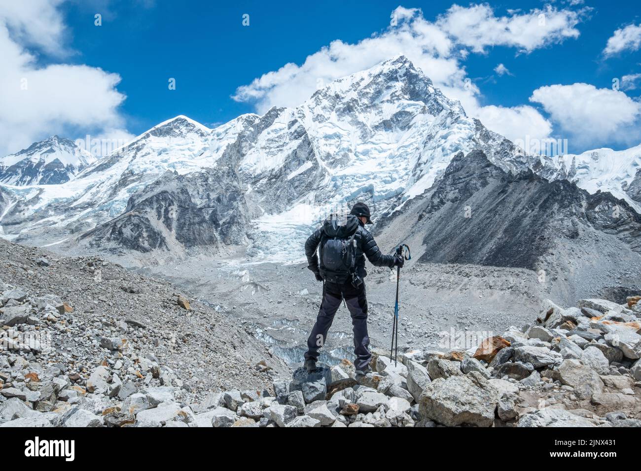 Male backpacker enjoying the view on mountain walk in Himalayas ... Male backpacker enjoying the view on mountain walk in Himalayas ...