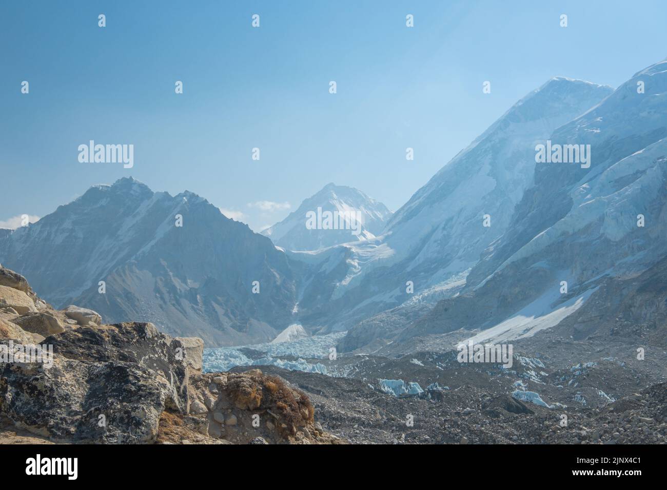 Male backpacker enjoying the view on mountain walk in Himalayas. Everest Base Camp trail route ...