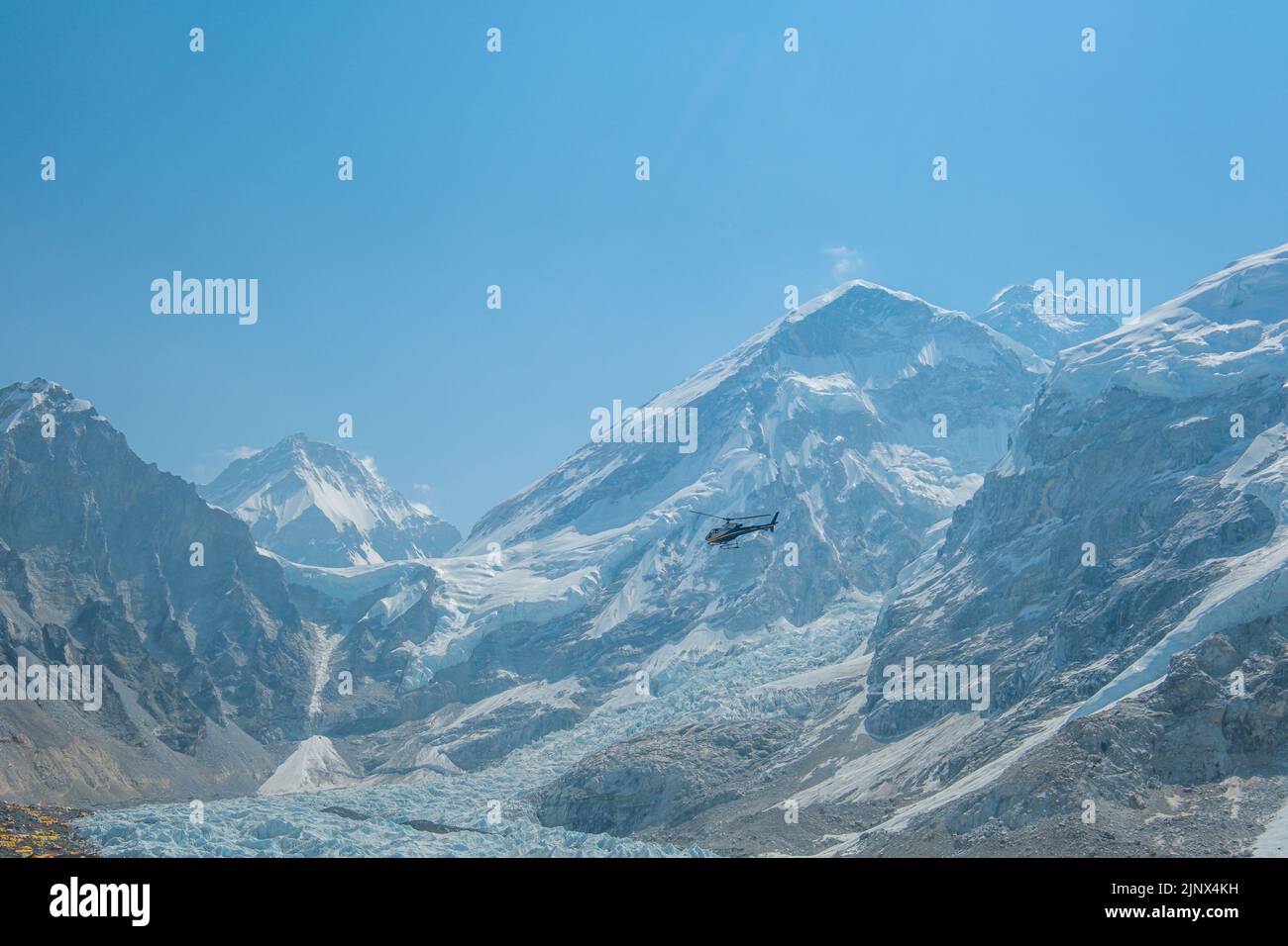 Everest base camp Gorakshep rescue helicopter in action Himalayas Nepal ...