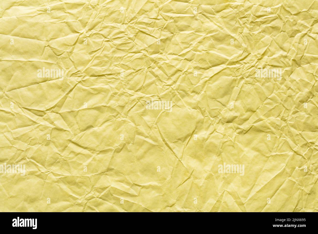Crumpled paper texture in light yellow color. Clasic paper background ...