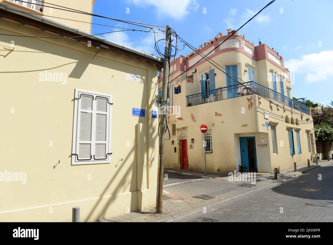 Walking through the narrow streets of the historical Neve Tzedek ...