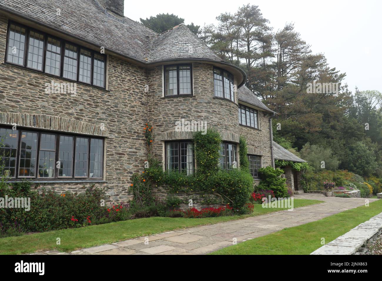 The rear view of an English country house in Devon, England. The ...