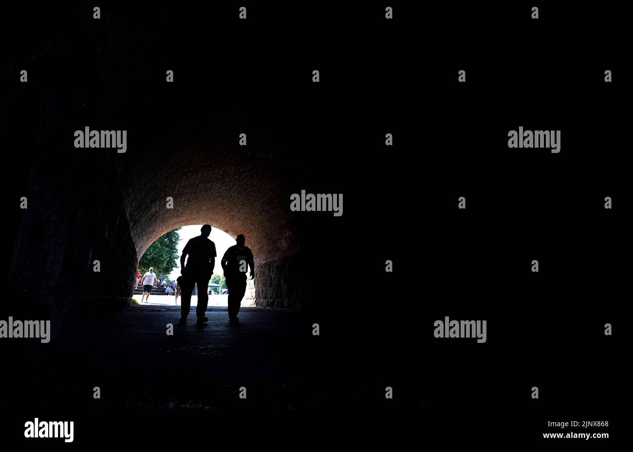 Nottingham Forest fans walk inside a tunnel towards the stadium ahead ...