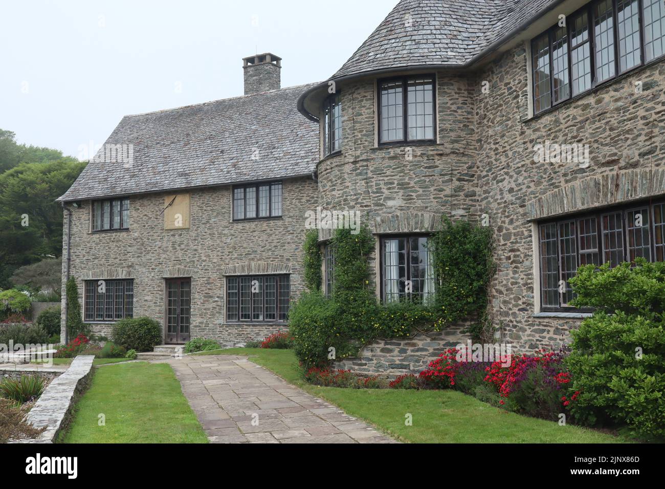 The rear view of an English country house in Devon, England. The ...
