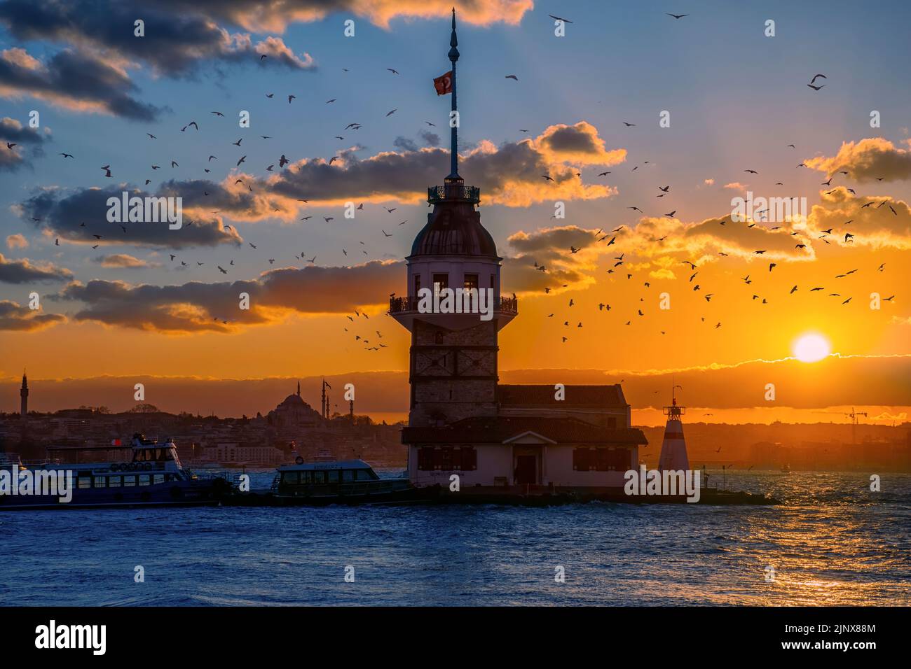 Awesome sunset at Maiden Tower. An iconic landmark on Istanbul's ...