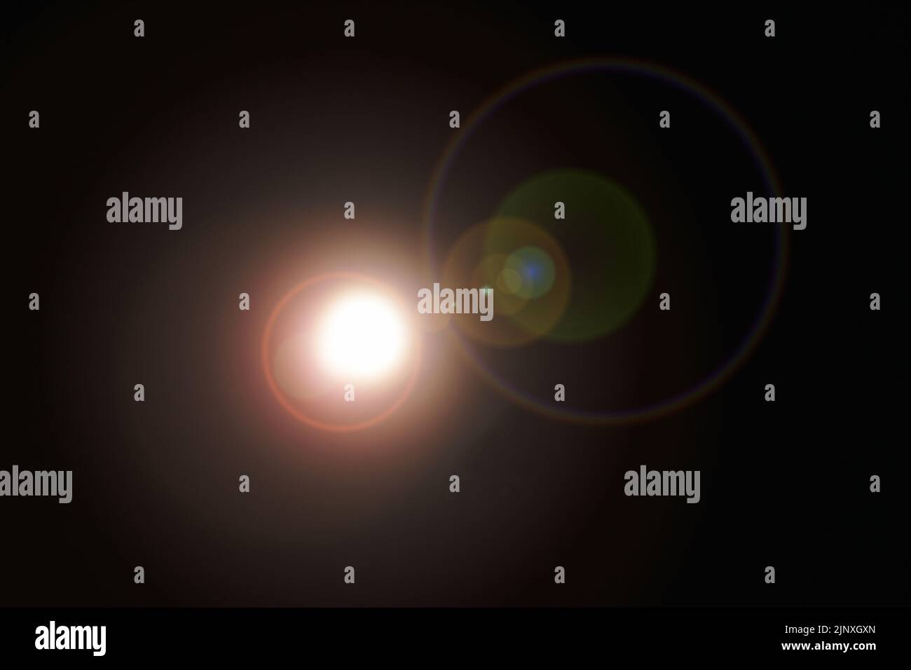 blur full moon cover by spreading cloud with light flare in night Stock ...