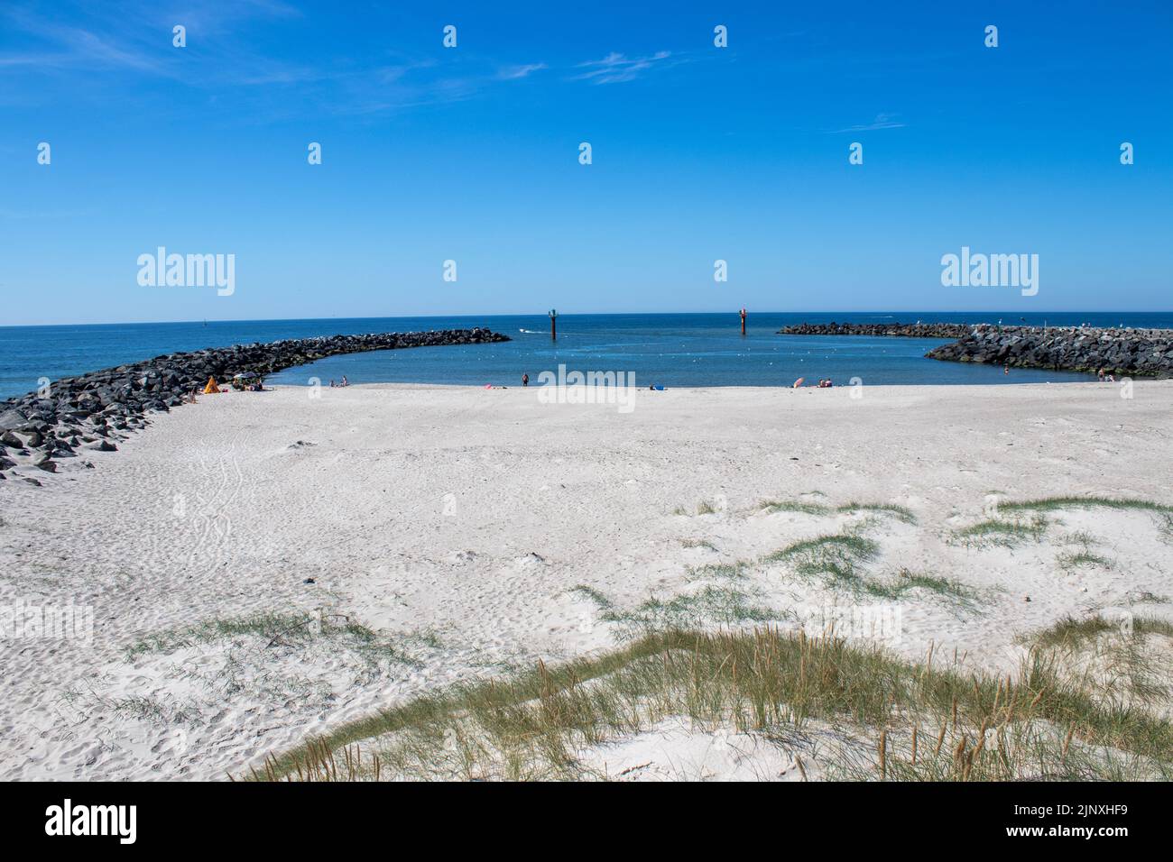 A port on the west coast of Denmark. Calm sea and blue sky in summer ...