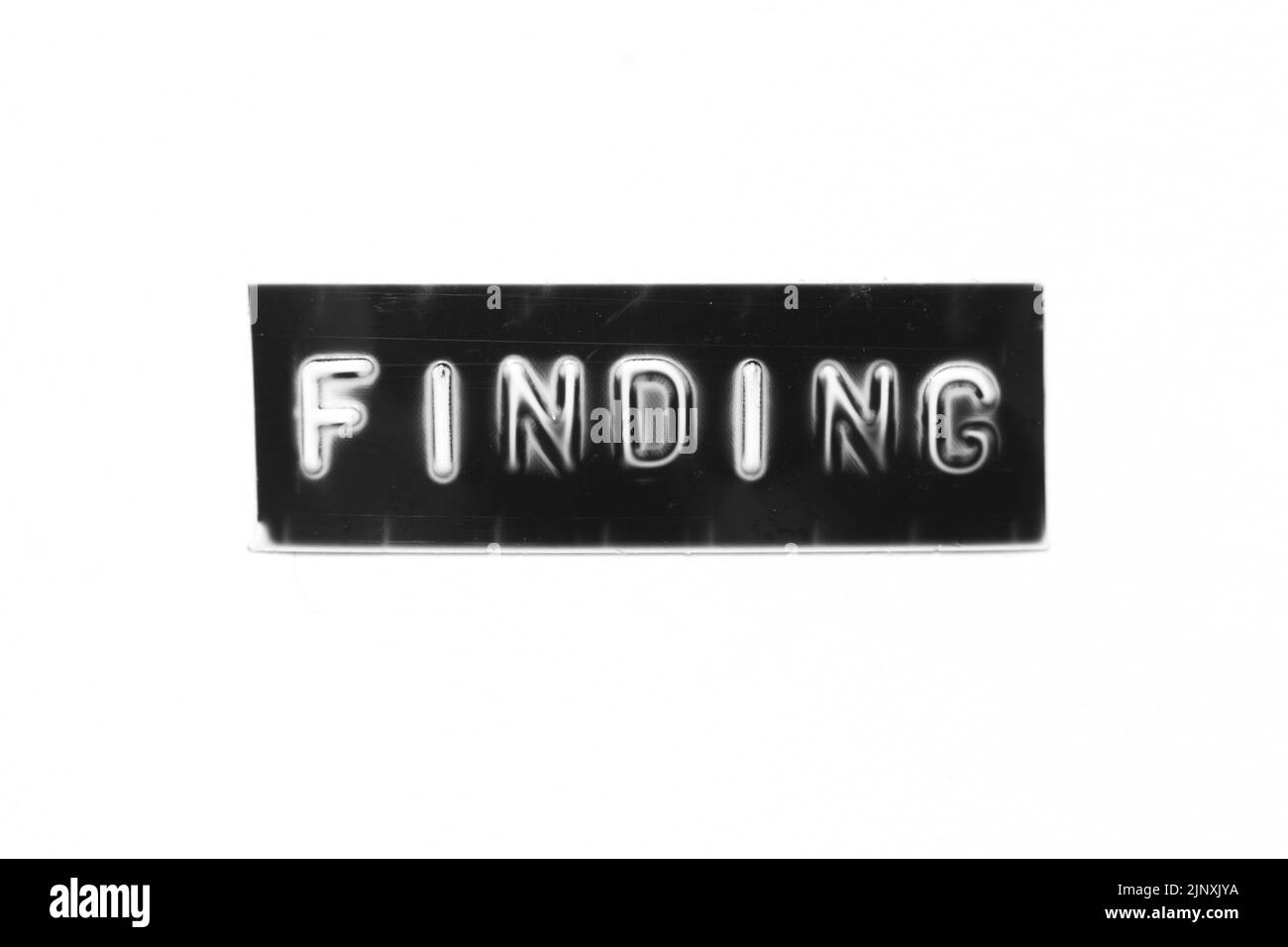 Black color banner that have embossed letter with word finding on white ...