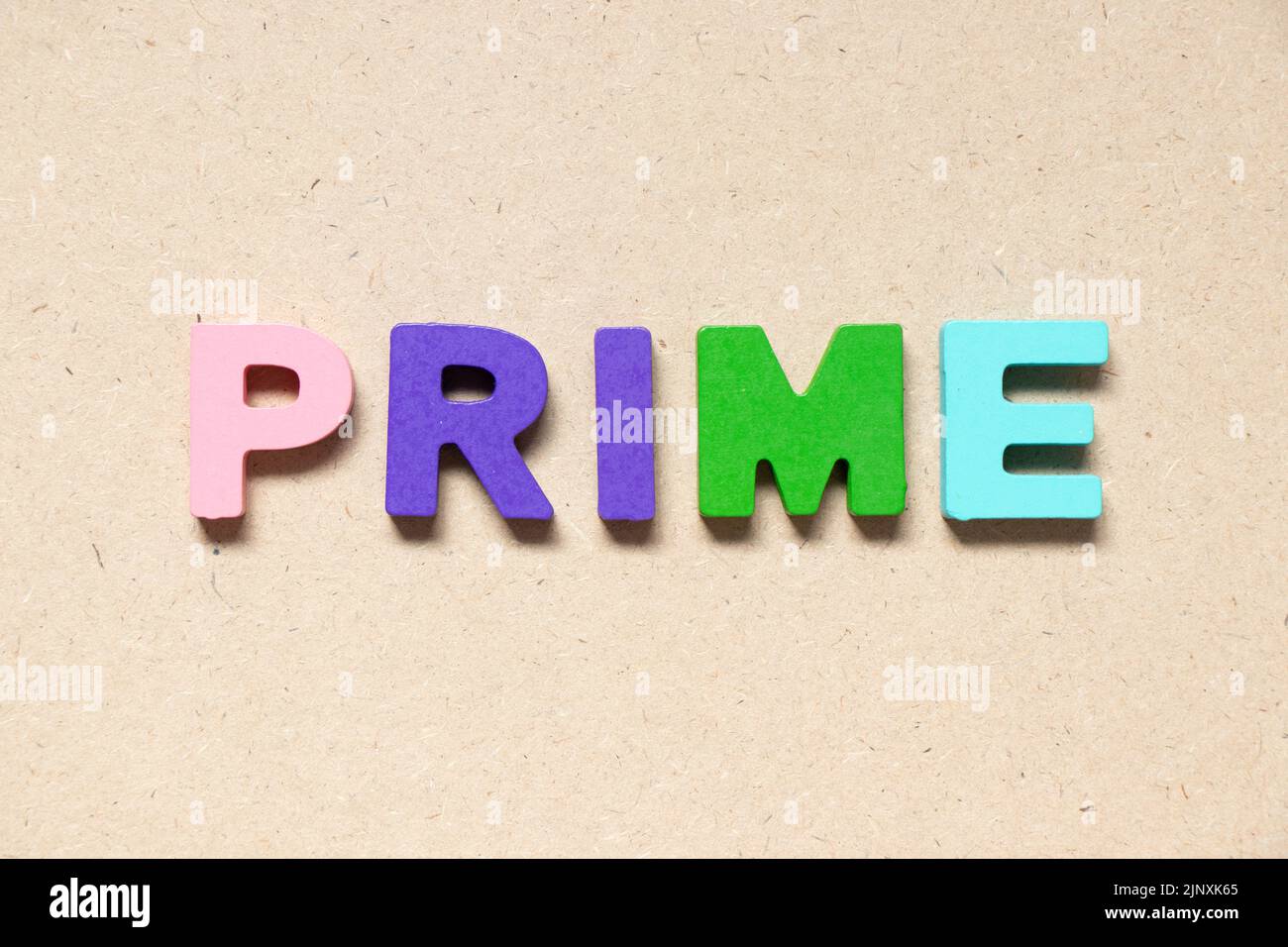 Color alphabet letter in word prime on wood background Stock Photo - Alamy