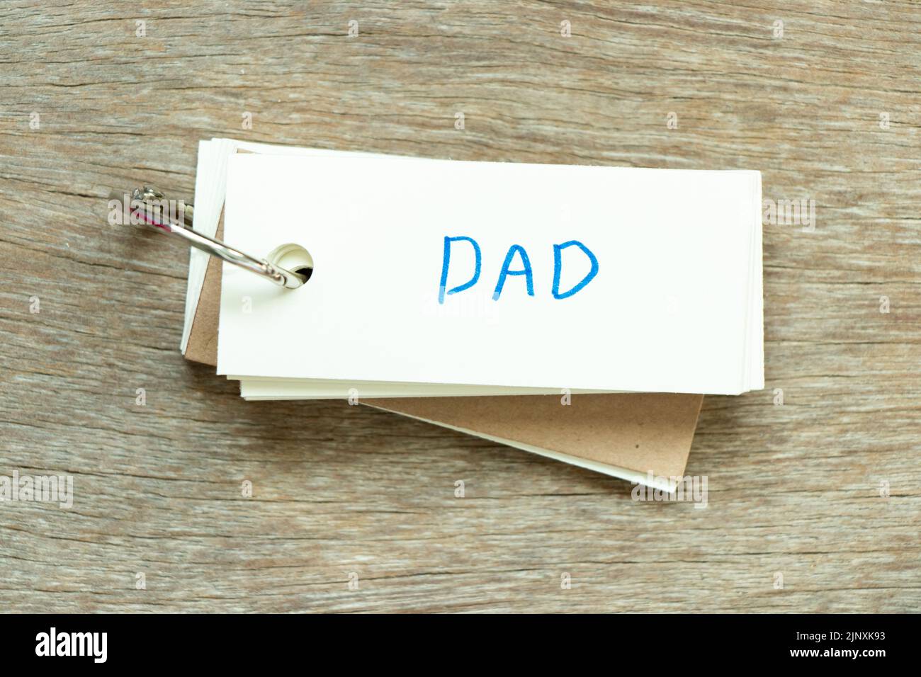 Flash card with handwriting word dad on wood background Stock Photo - Alamy