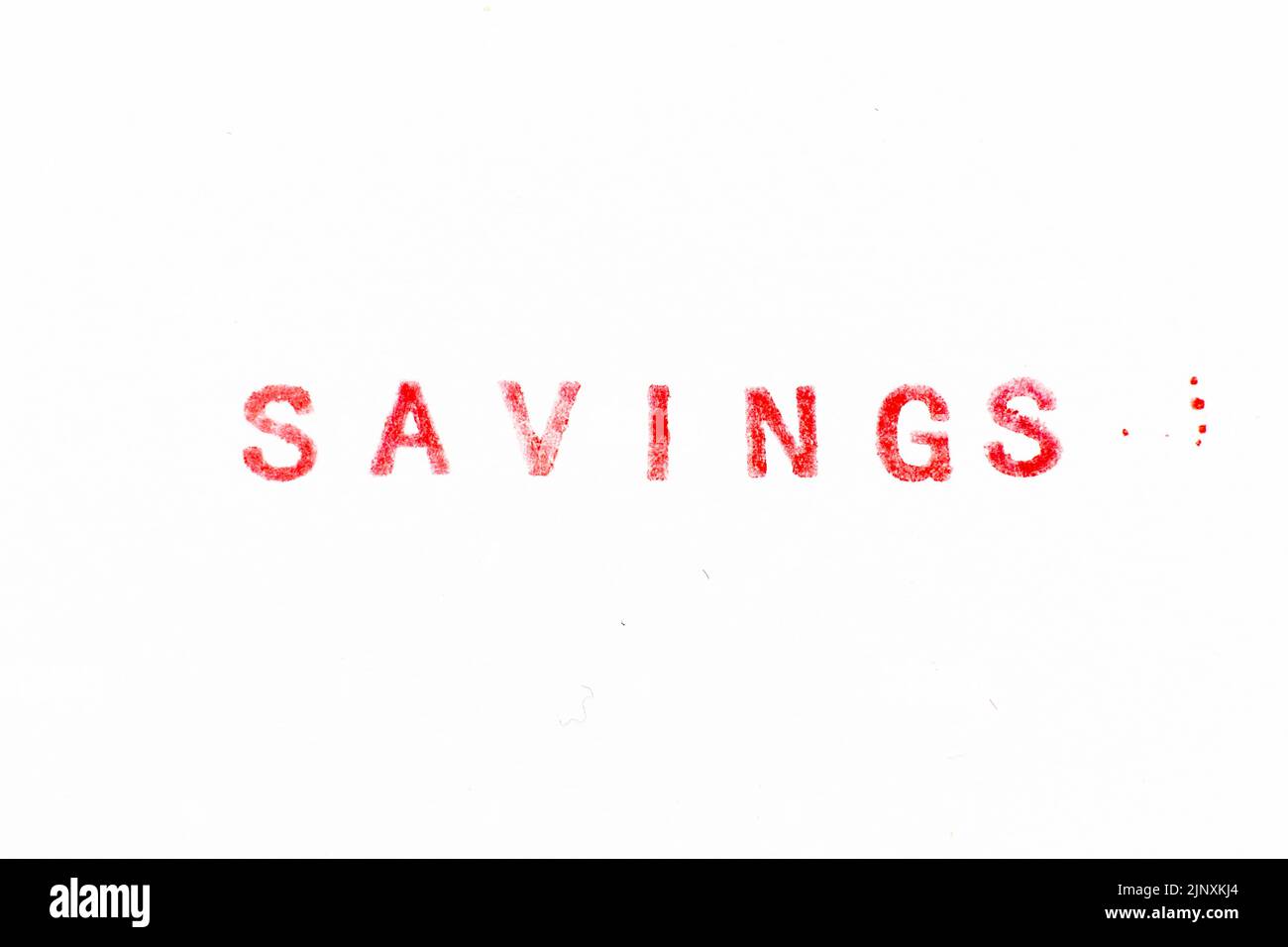 Red color ink rubber stamp in word savings on white paper background ...