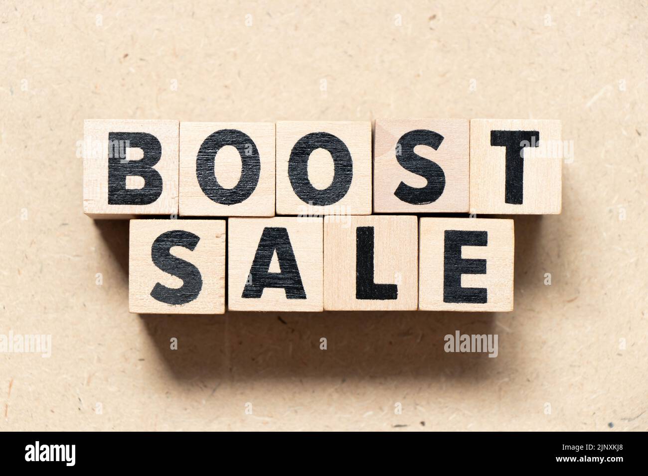 Alphabet letter block in word boost sale on wood background Stock Photo ...