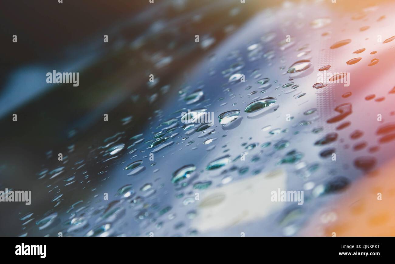 Sun after rain. Drops on glass. It's been raining. Texture on glass ...
