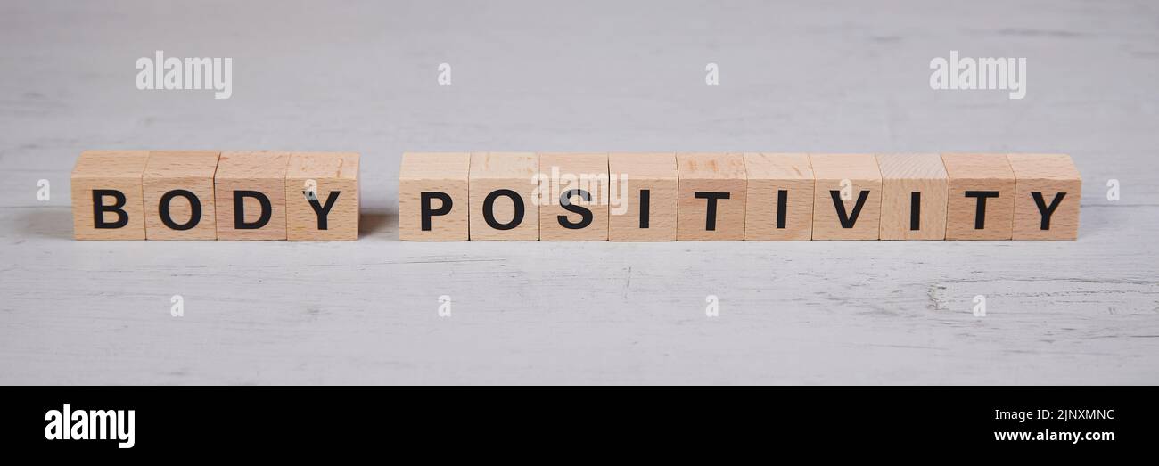 wooden blocks building the word body positivity Stock Photo - Alamy