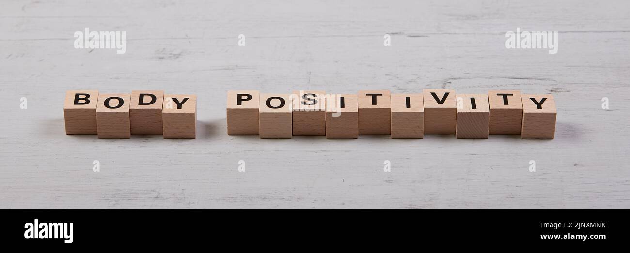 wooden blocks building the word body positivity Stock Photo - Alamy