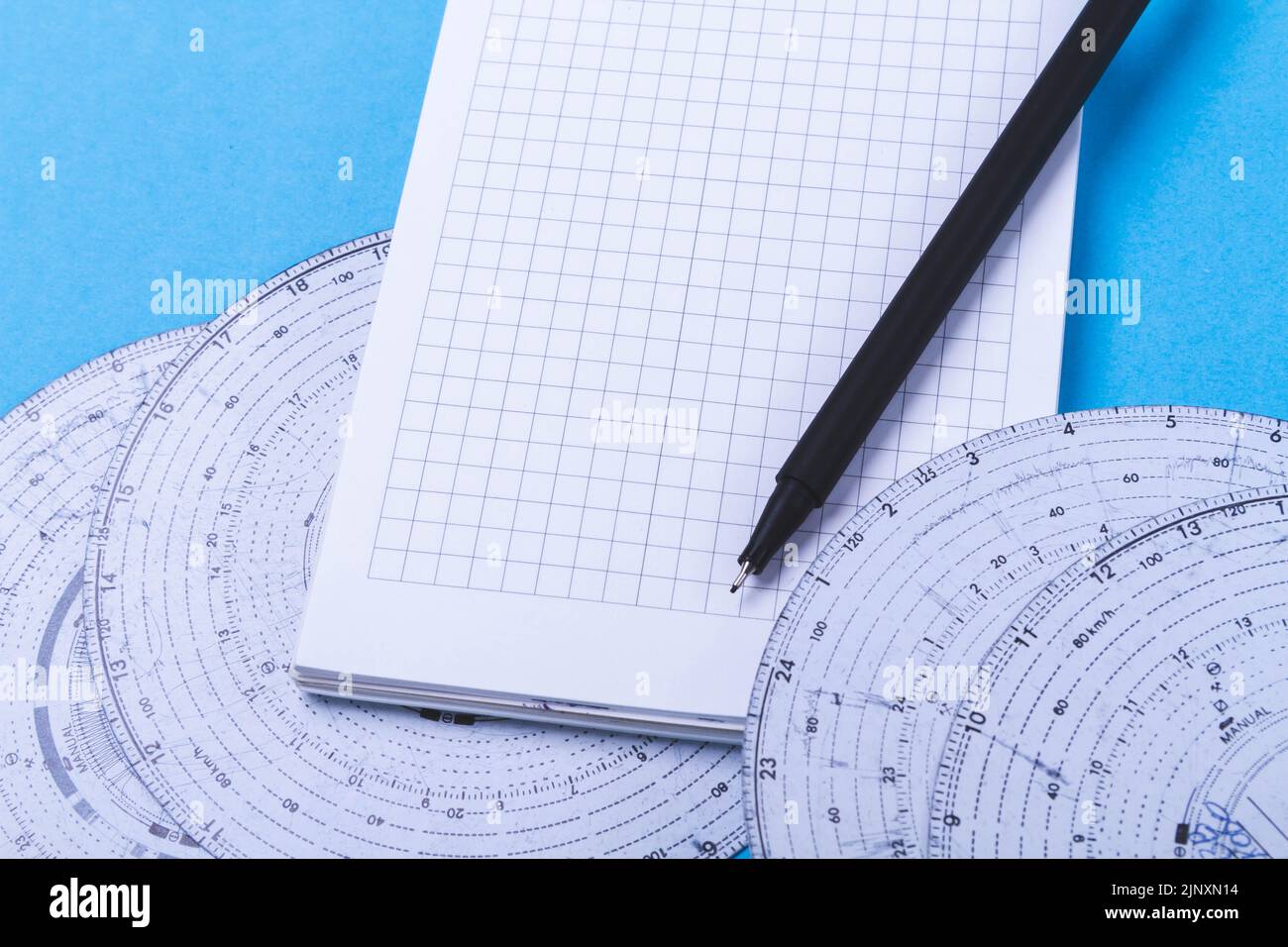 Tachograph and notepad. Driver time tracking. Fixing the movement of ...