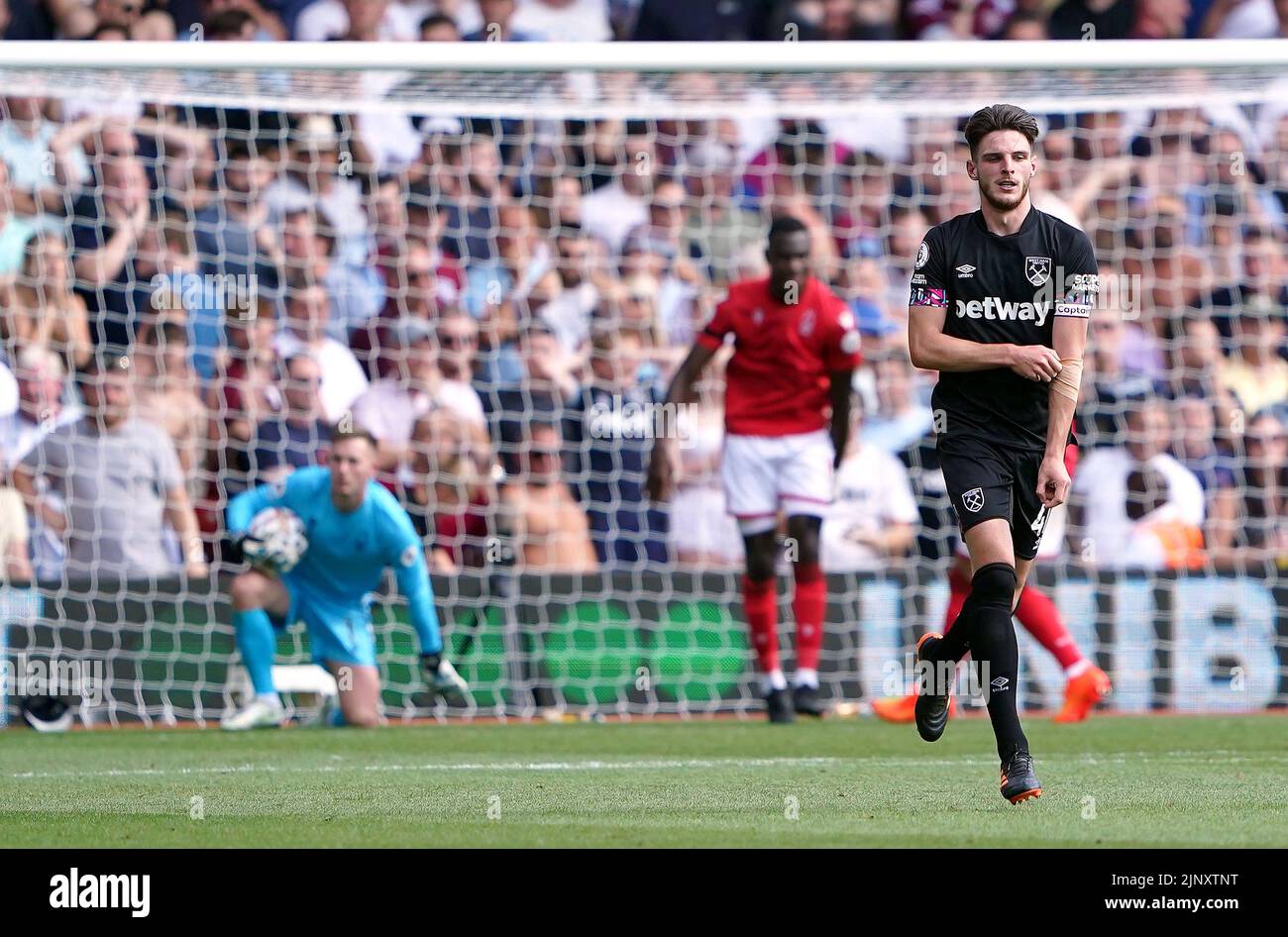West Ham United's Declan Rice (right) looks dejected after seeing ...