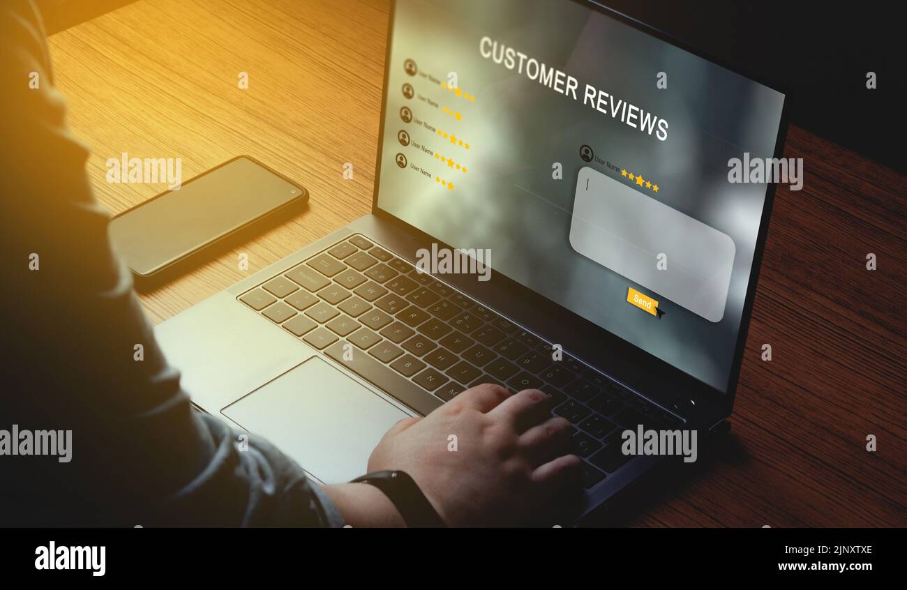 Woman rating a service on laptop. Customer review satisfaction feedback ...