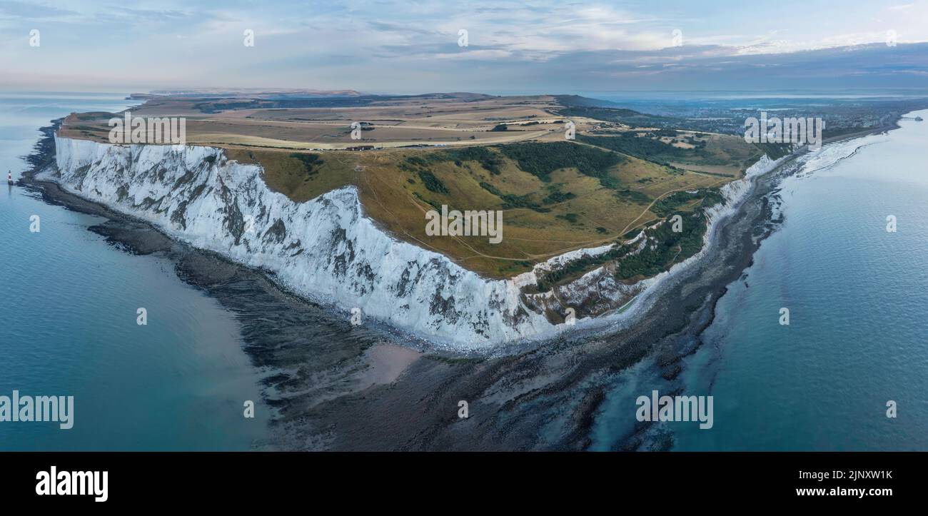Beautiful Summer sunrise landscape image of Beachy Head Lighthouse in ...