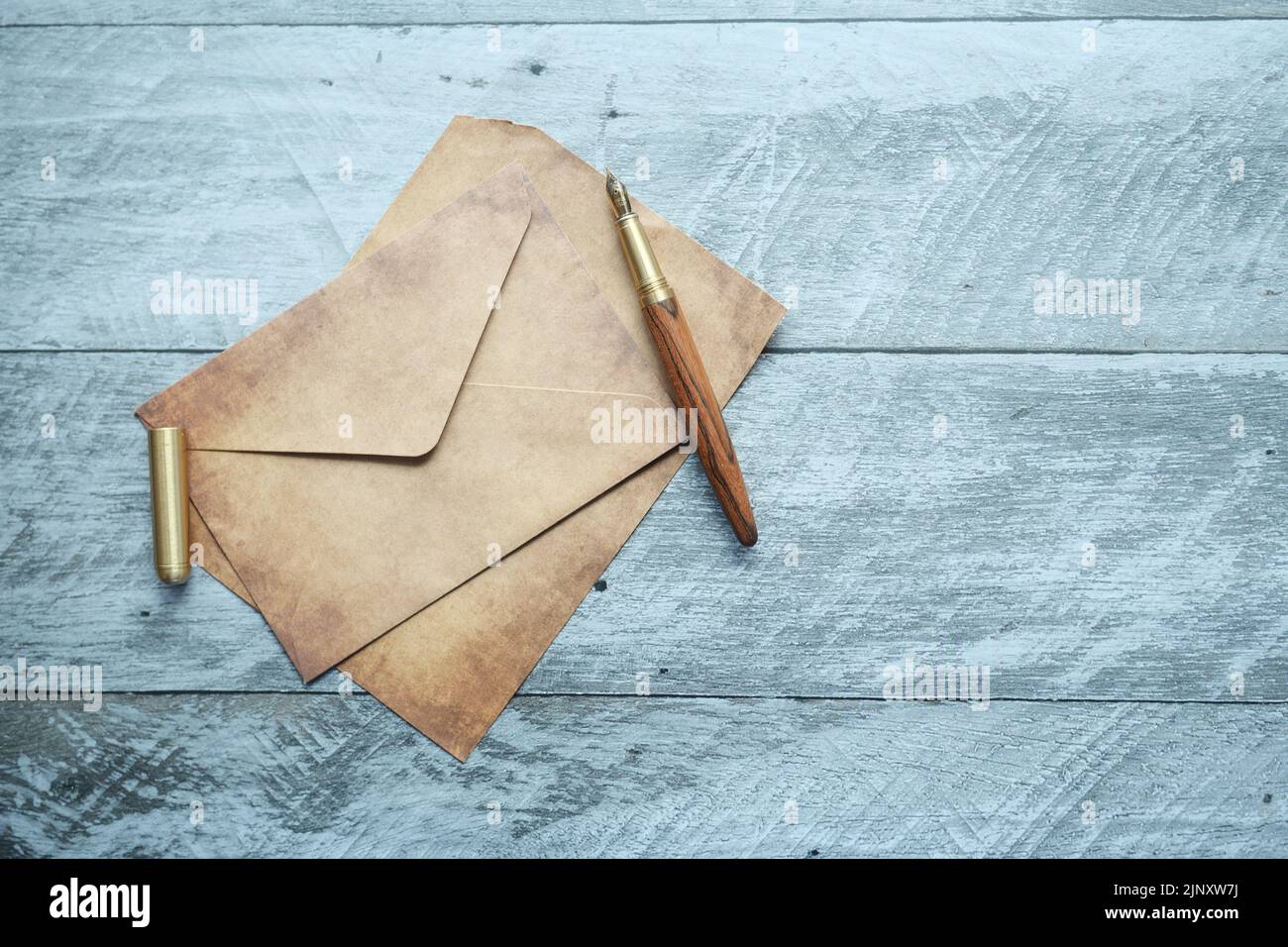 envelope , empty paper and fountain pen on table Stock Photo - Alamy