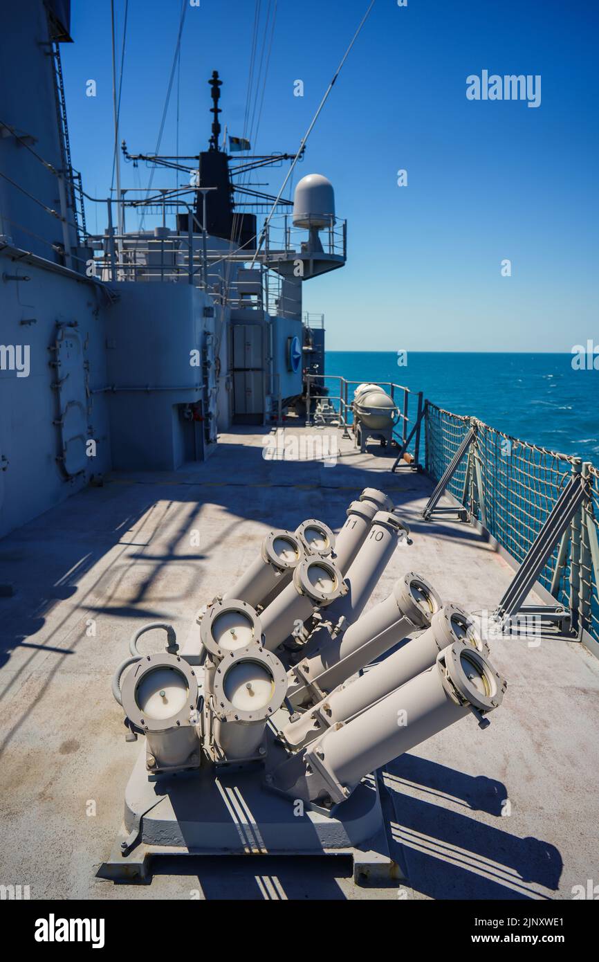 Chaff launcher is seen on the deck of a military ship sailing on the ...