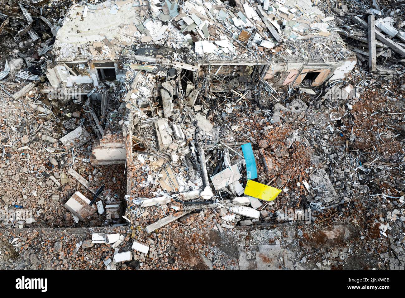 Top view of the destroyed building. Aerial view of the ruins. the ...