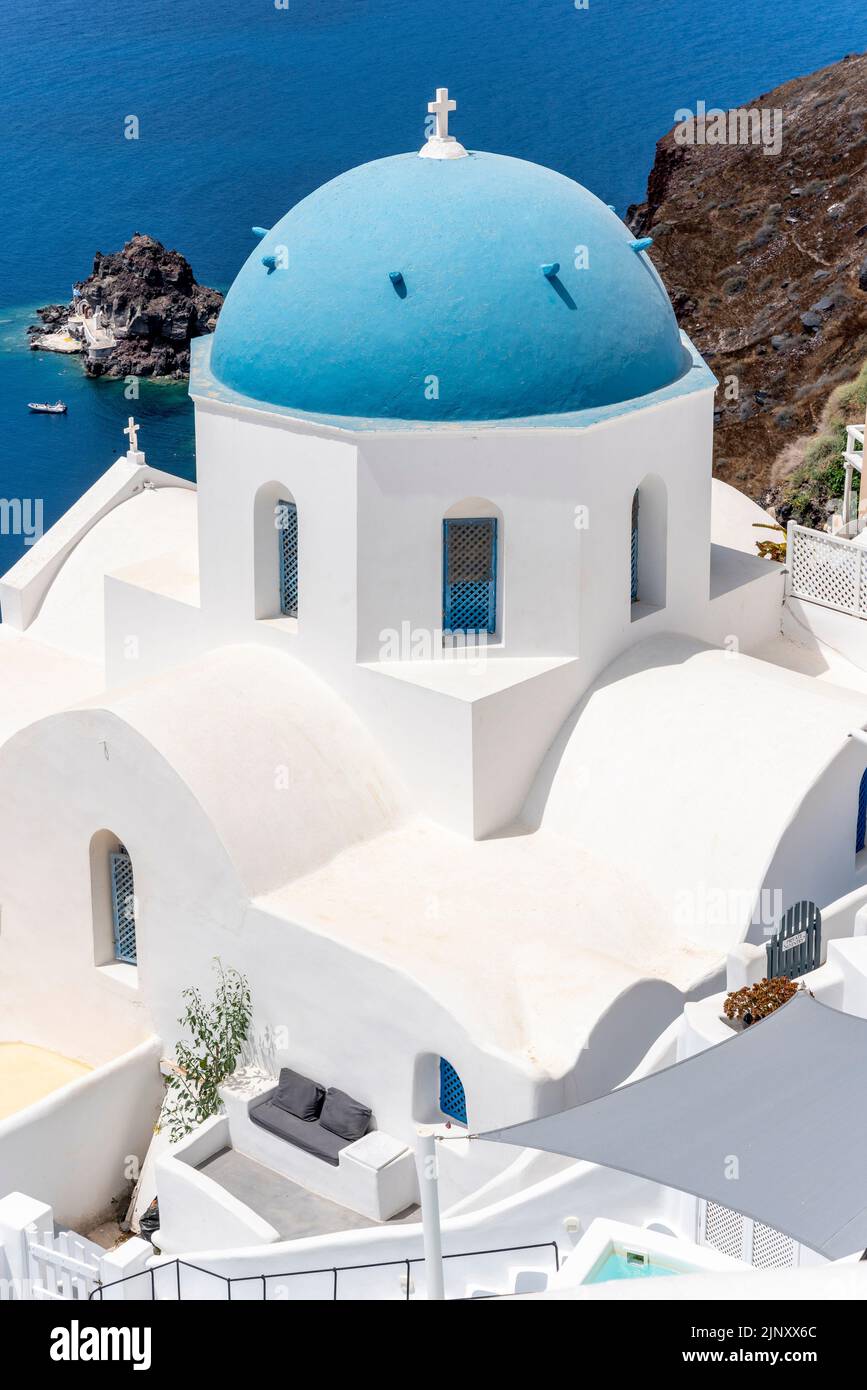 A Classic View Of A Blue Dome Church In The Town Of Oia, Santorini ...