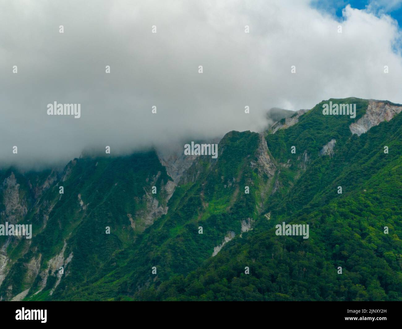 Green slopes and rugged cliffs near peak of Mt. Daisen in Tottori, Japan Stock Photo - Alamy