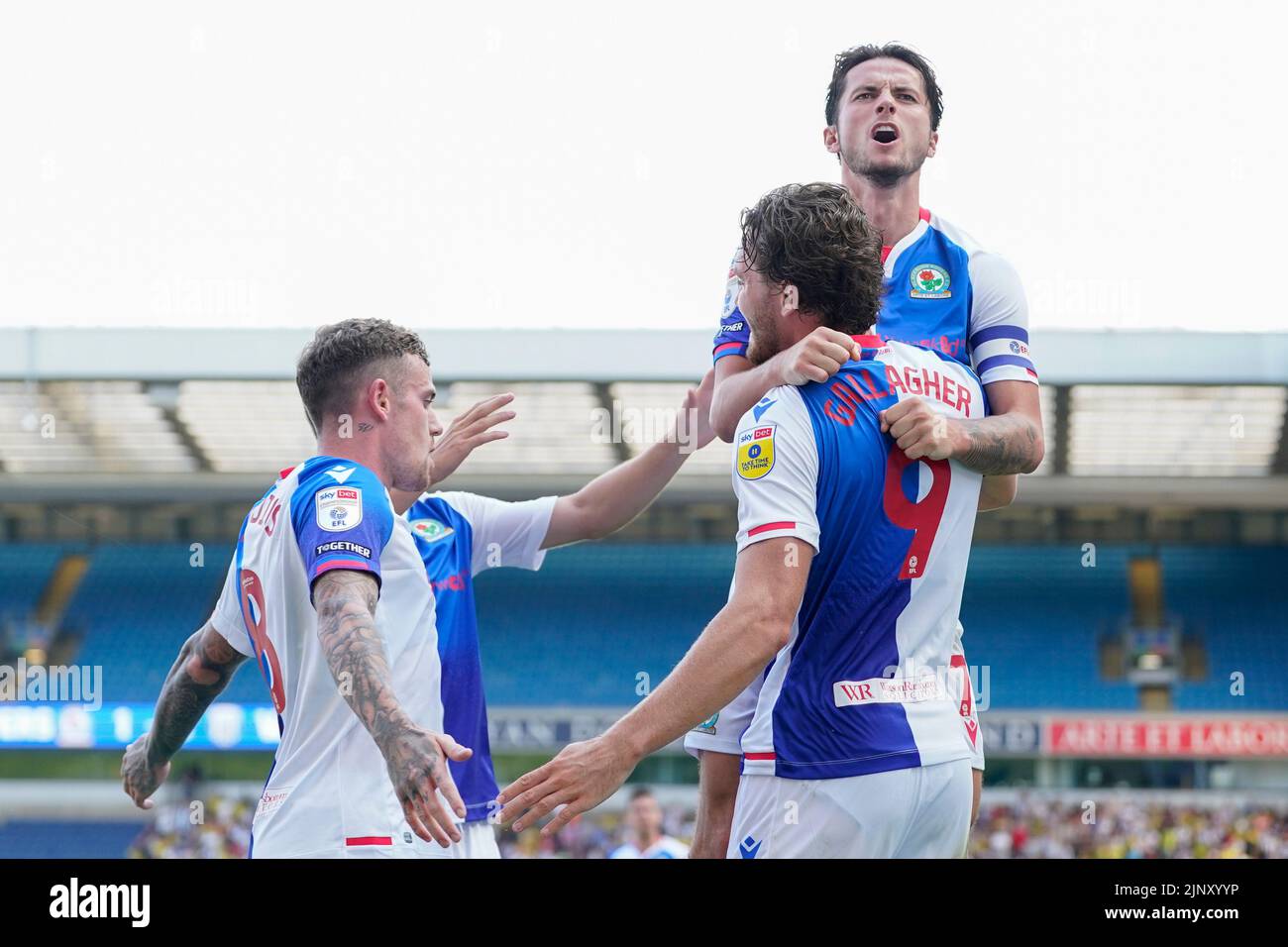 Lewis Travis #27 of Blackburn Rovers celebr5ates with Sam Gallagher ...
