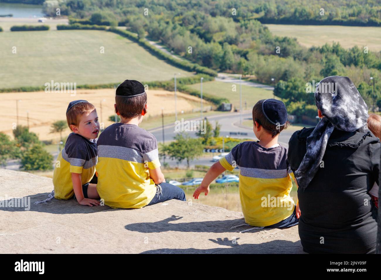 Orthodox Jewish family day 3 boys wearing traditional kippurs yarmulke ...