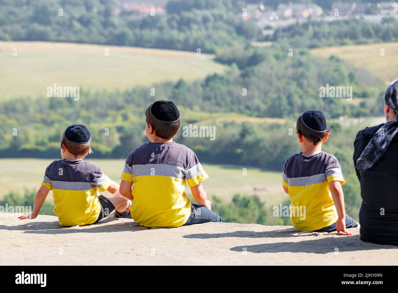 Orthodox Jewish family day 3 boys wearing traditional kippurs yarmulke ...