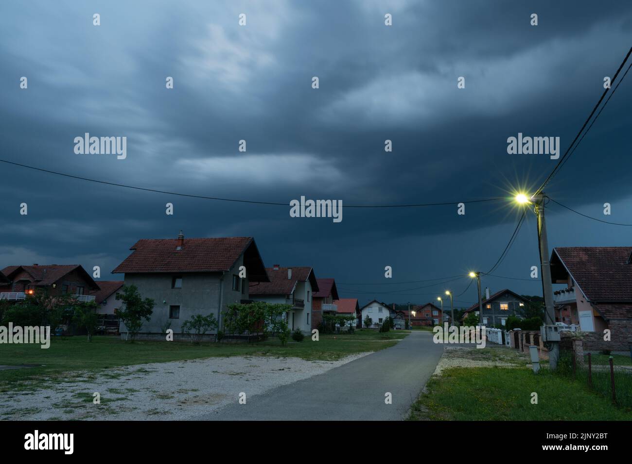 Storm cloud above suburbs, bad weather Stock Photo - Alamy