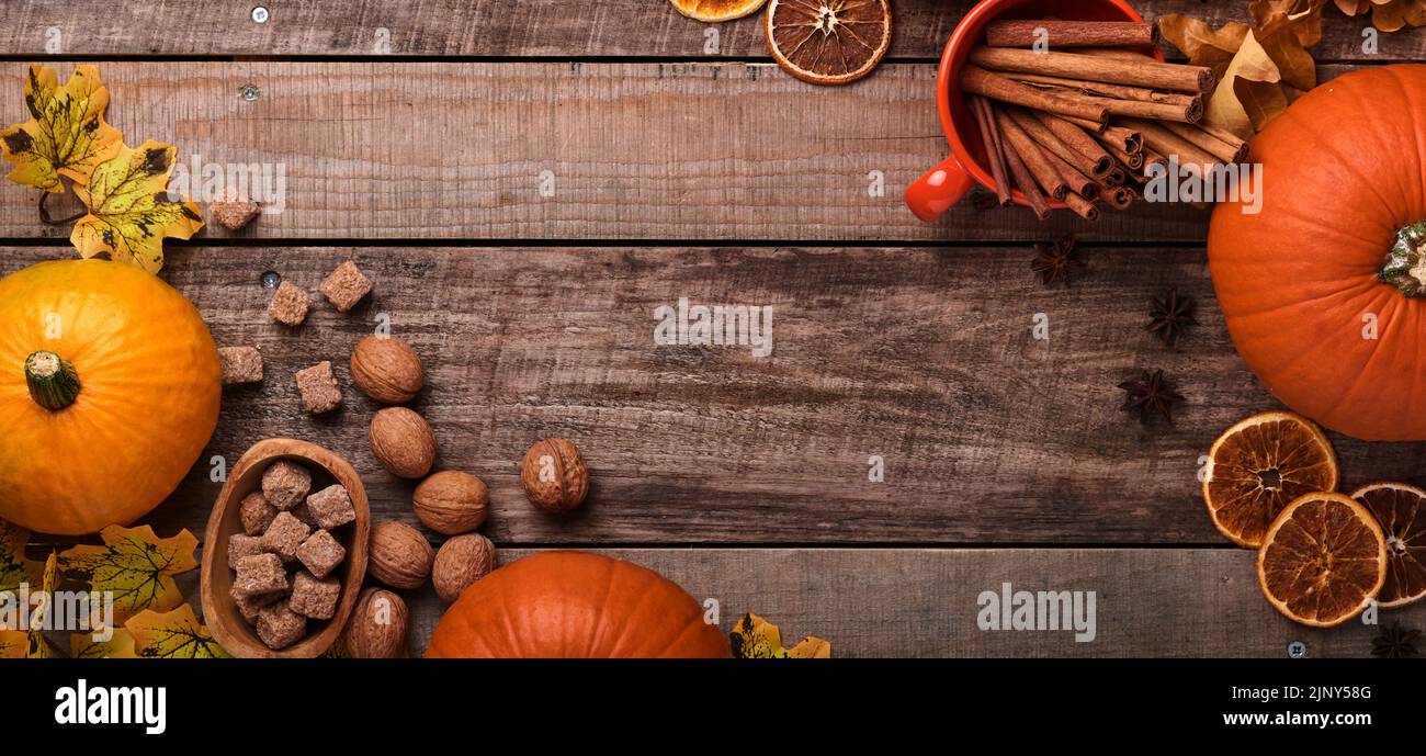 Pumpkin. Autumn food background with cinnamon, nuts and seasonal spices ...