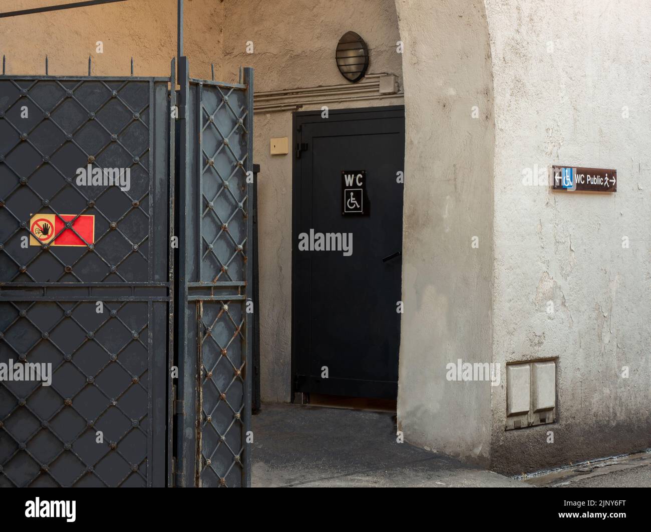 Public toilet door with wheelchair sign reserved for the disabled. Next ...