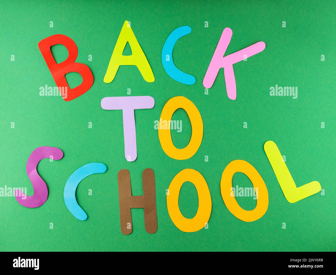 Inscription Back to school with multicolored paper letters. Back to ...