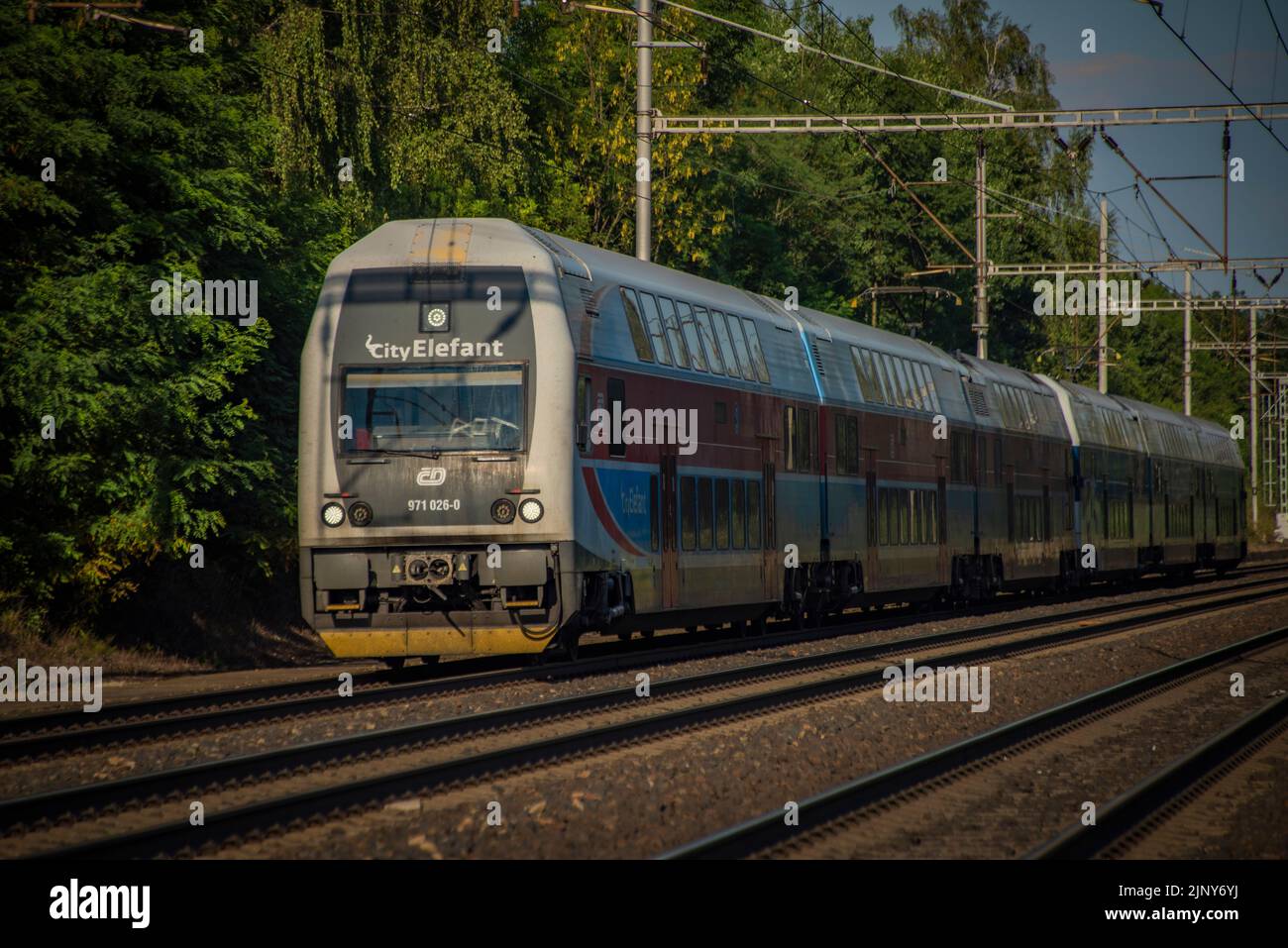 Trains on main czech railway Prague Kolin in summer hot sunny evening ...