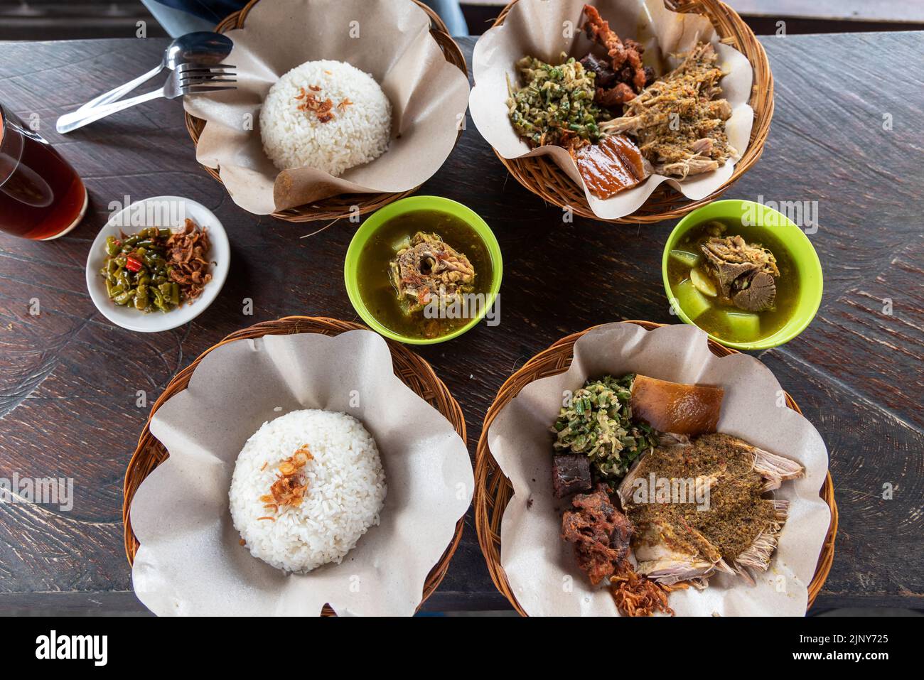 Balinese Traditional Food Rice with Babi Guling and Sambal Terasi Stock ...