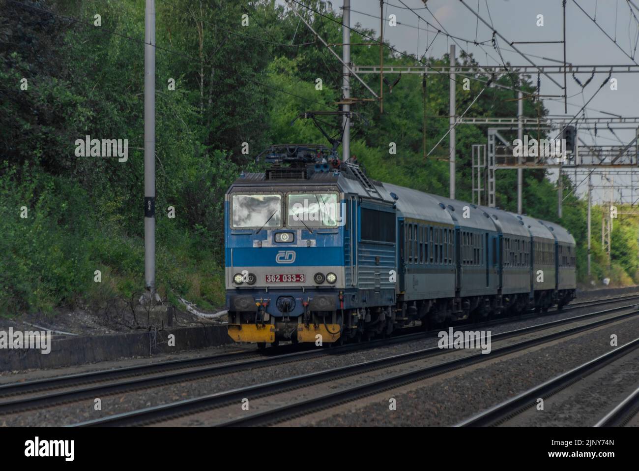 Trains on main czech railway Prague Kolin in summer hot sunny evening ...