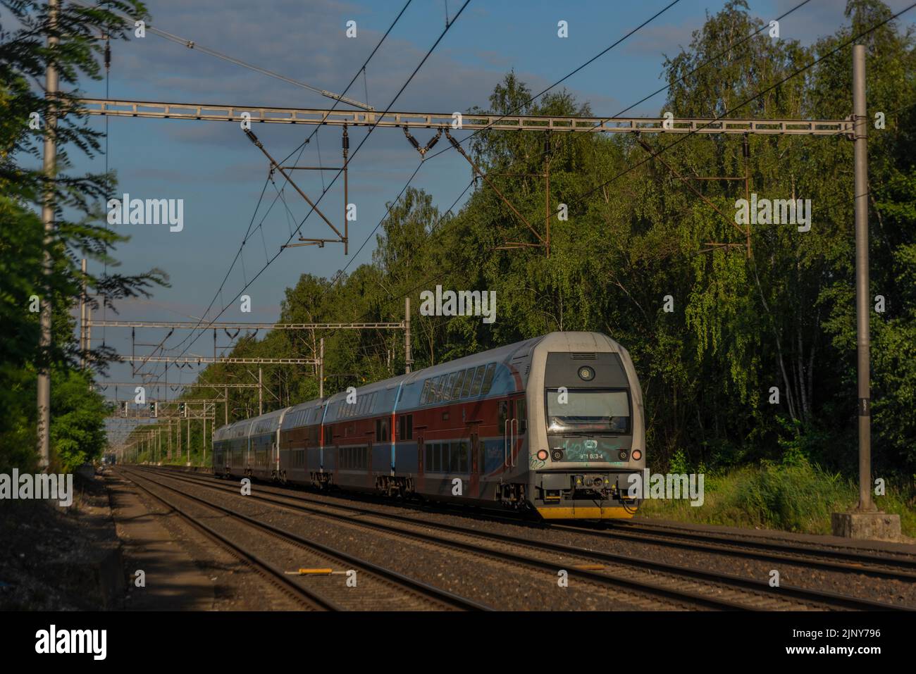 Trains on main czech railway Prague Kolin in summer hot sunny evening ...