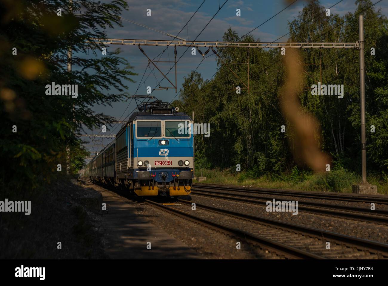 Trains on main czech railway Prague Kolin in summer hot sunny evening ...