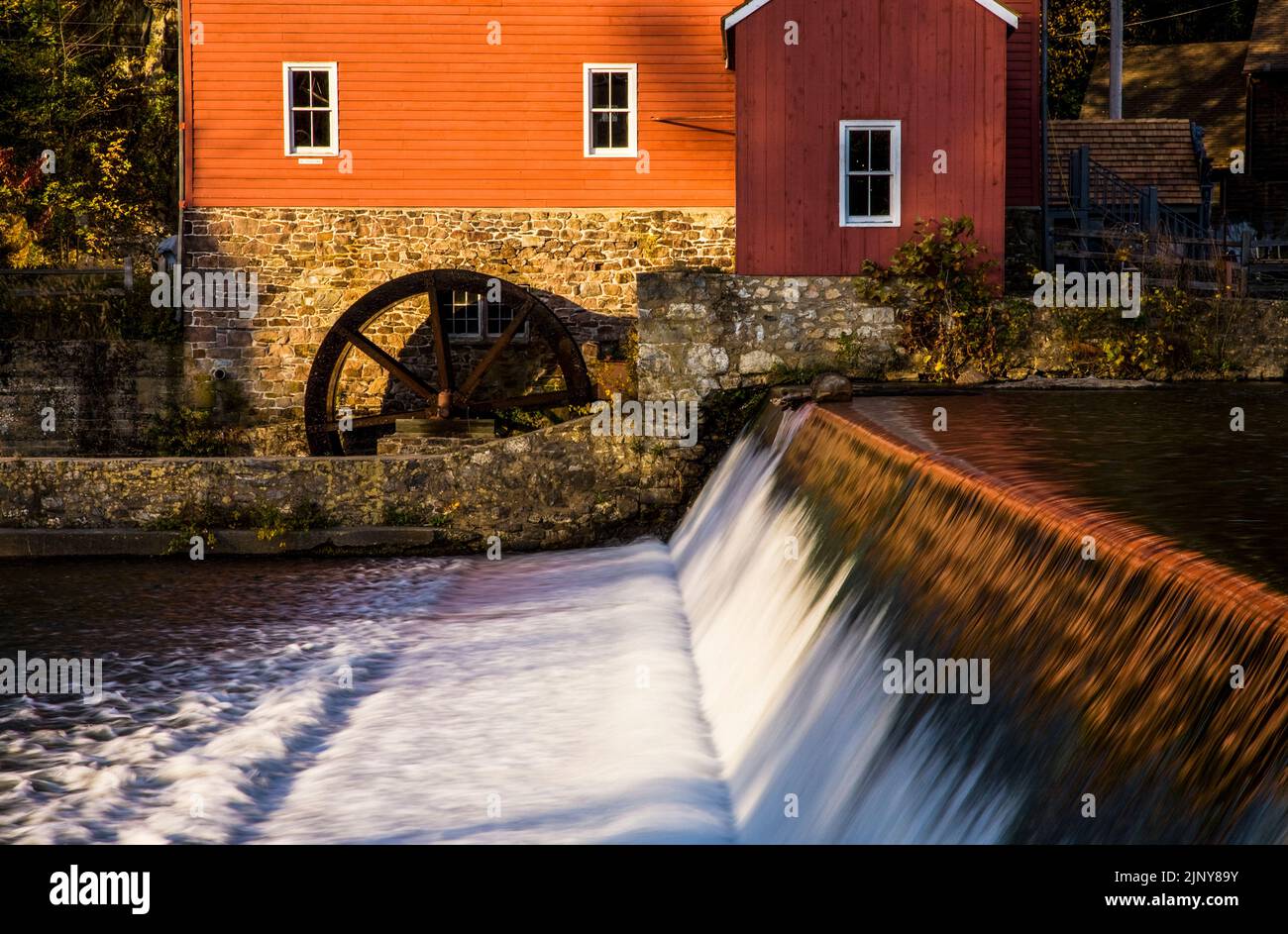 Morning sun on The Red Mill and damn on the Raritan River, Clinton, New ...