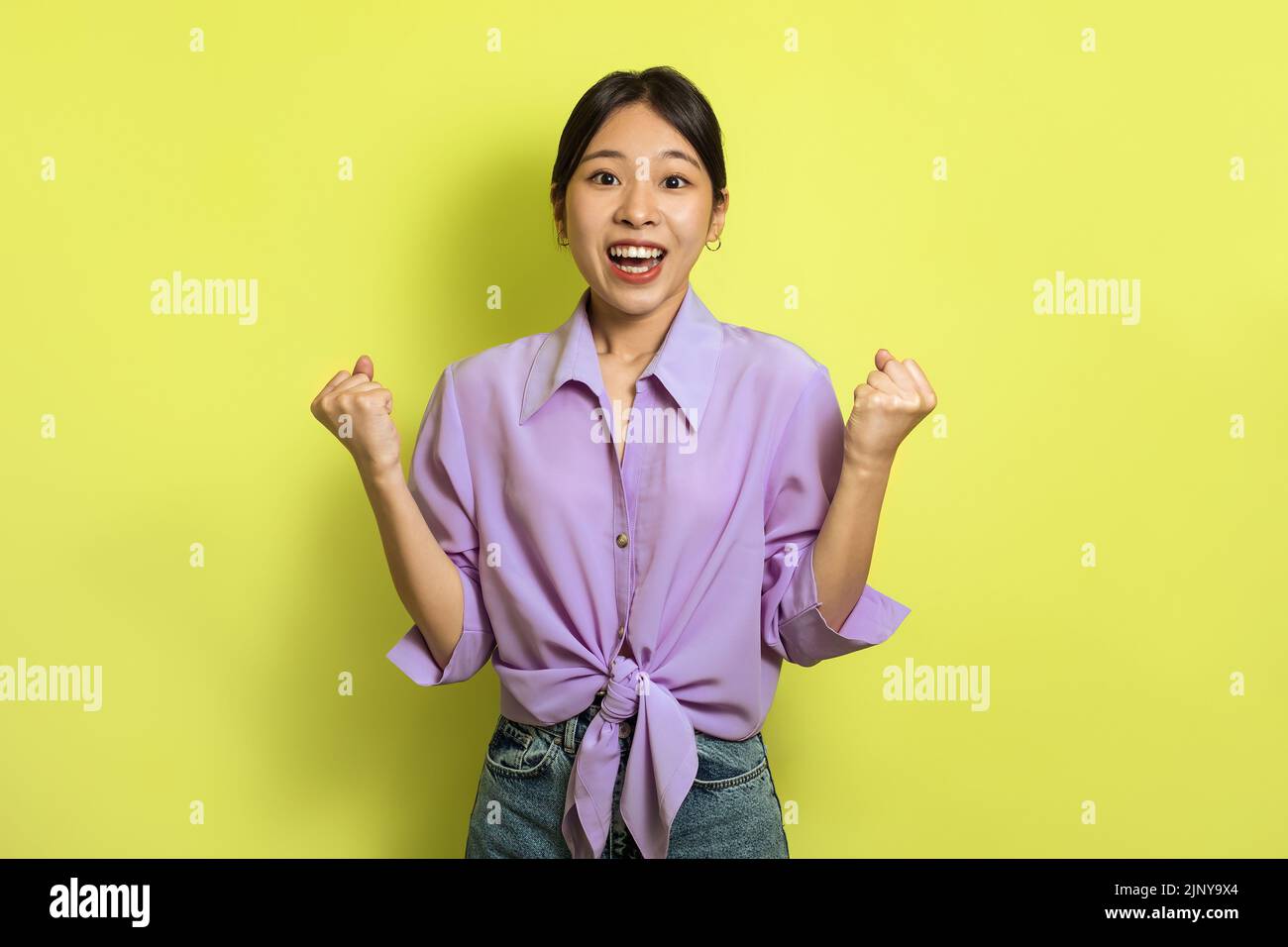 Joyful Chinese Woman Gesturing Yes Celebrating Success On Yellow ...