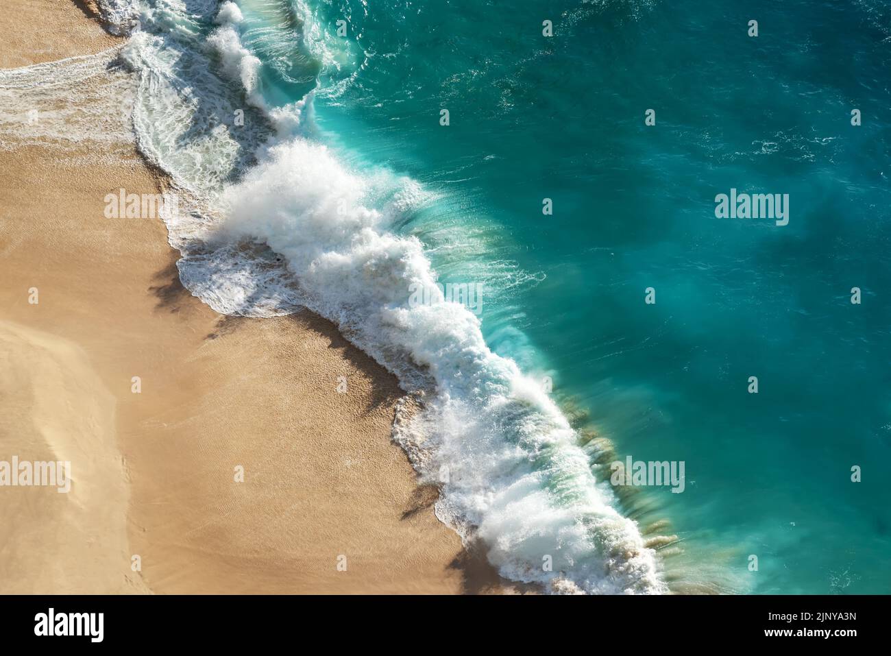 Aerial view of tropical ocean with waves in Bali Indonesia Stock Photo ...