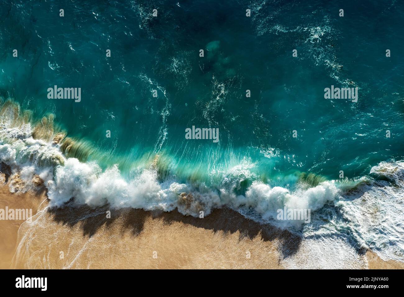 Aerial view of tropical ocean with waves in Nusa penida Bali Indonesia ...