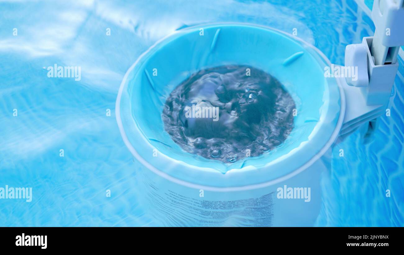 Pool maintenance - skimmer basket collects dirt and trash. Filtration ...