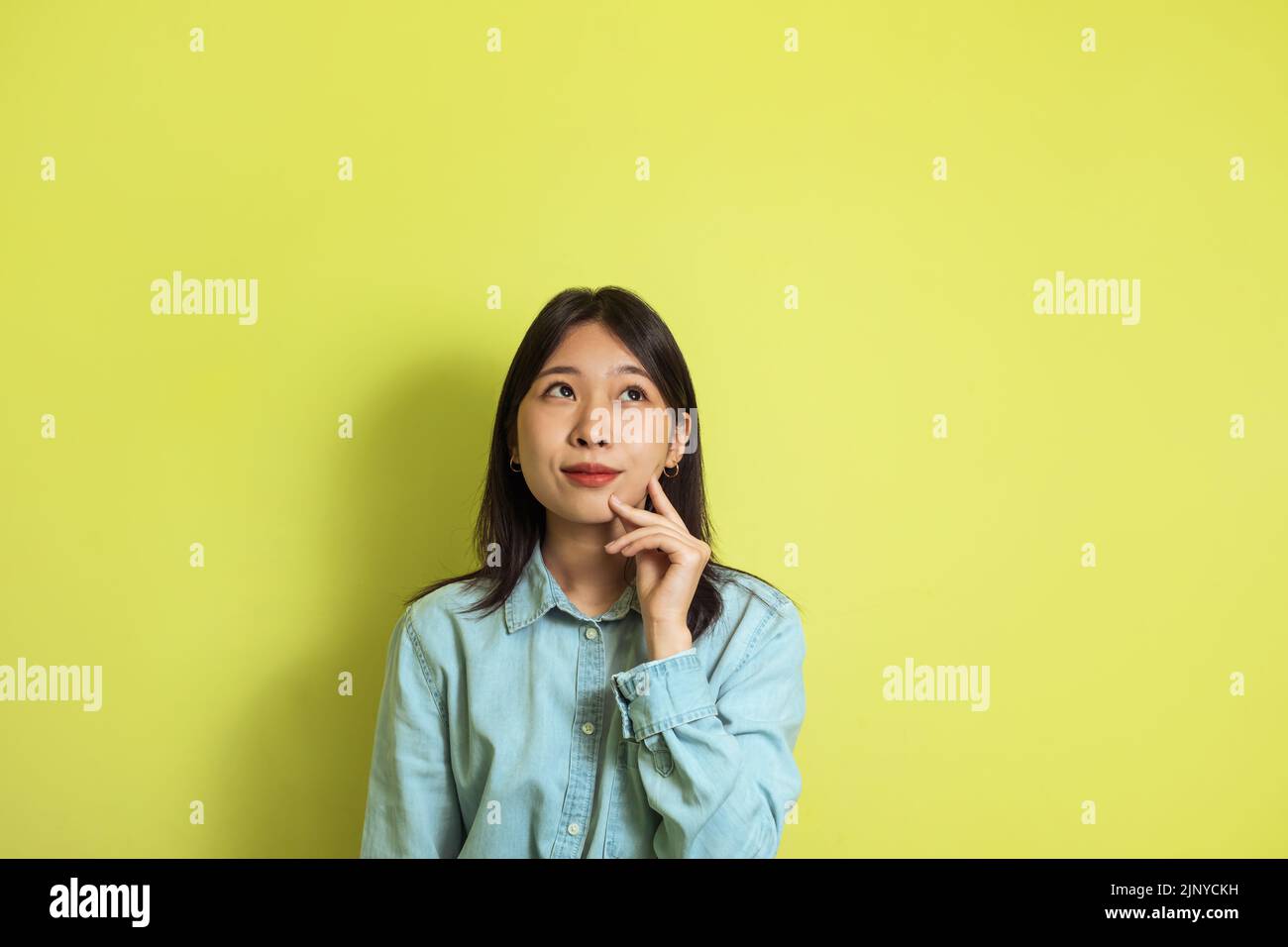 Portrait thoughtful millennial asian hi-res stock photography and ...