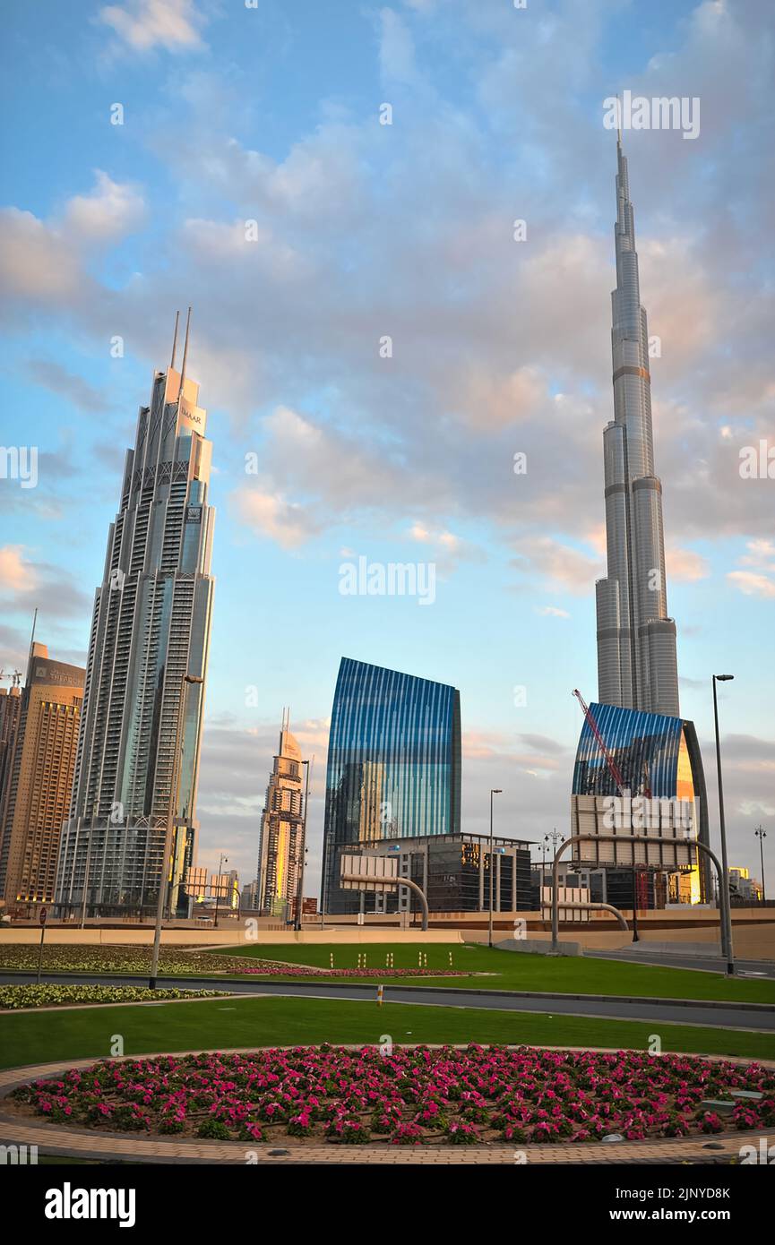 Vertical shot of Downtown Dubai at sunset with the world's tallest ...