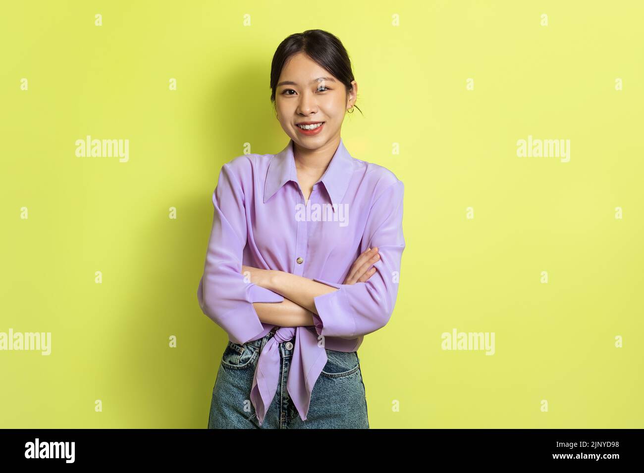 Confident asian woman crossing hands hi-res stock photography and ...