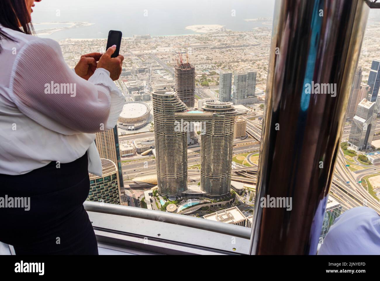 Dubai, UAE - 07.18.2021 -Visitor at the highest observation deck in ...
