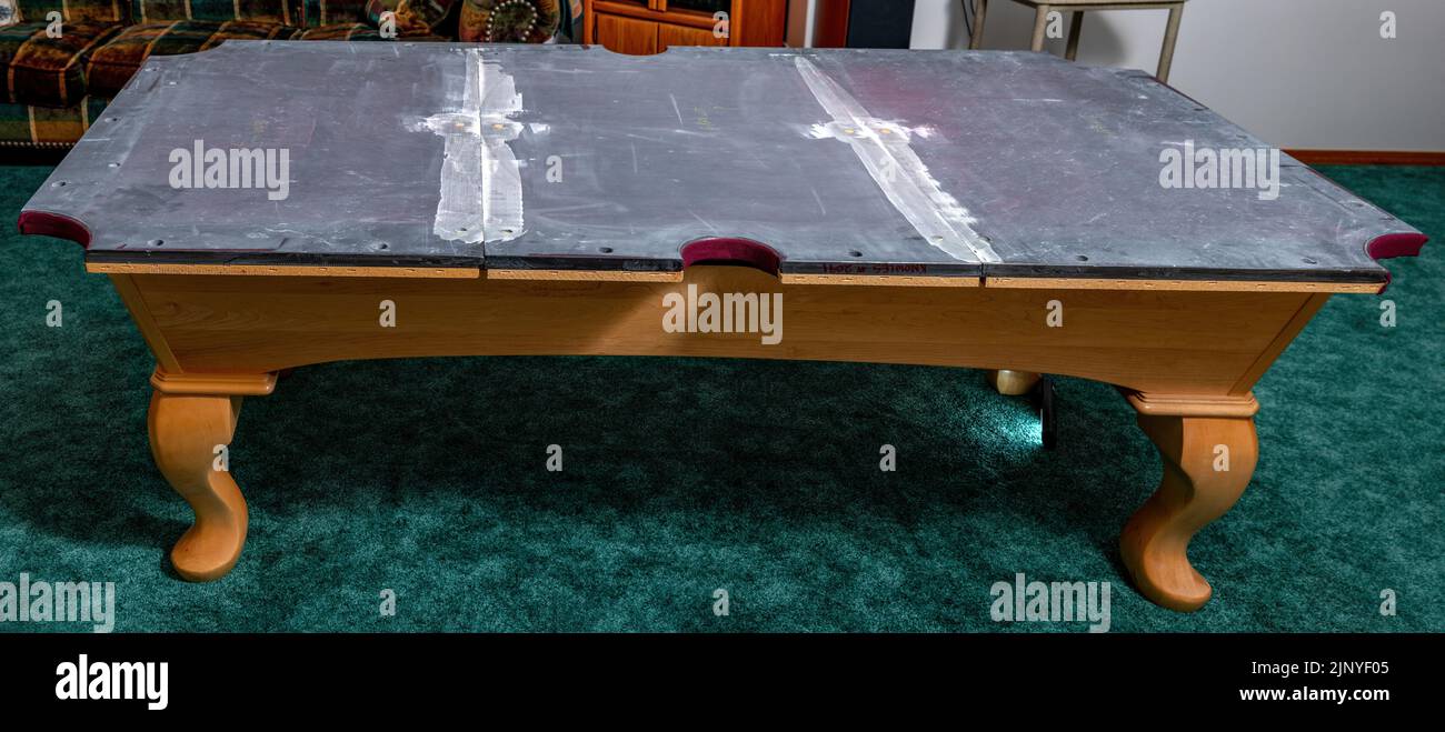 Slate slabs on a pool table on a maple wood frame Stock Photo - Alamy